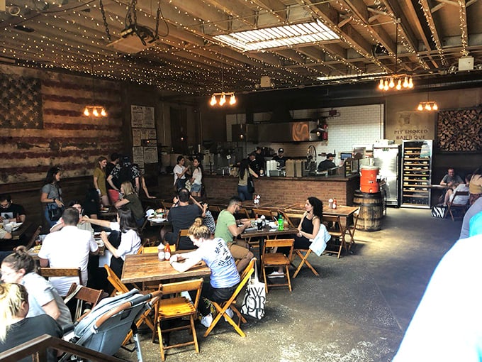 Rustic wooden tables beneath twinkling string lights create that magical atmosphere where strangers become friends and calories don't count. 