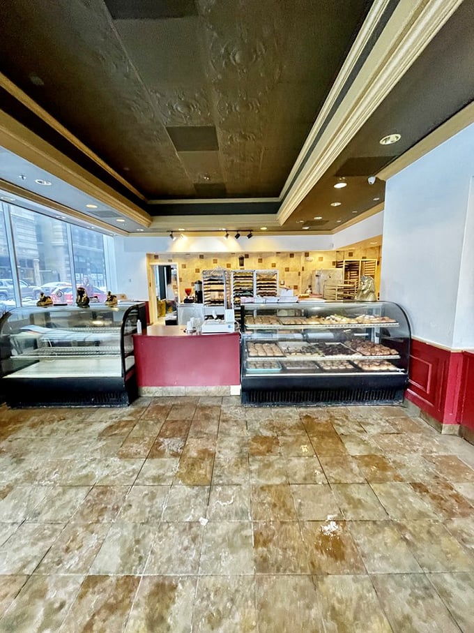 Behind this glass lies the answer to "What would happiness look like if it were shaped like a circle?" A donut showcase that turns adults into wide-eyed children.