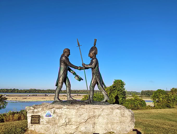 Lewis and Clark shake hands at the launching point of their epic journey west. If only these bronze explorers could share what they witnessed here in 1803!