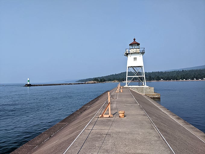 The iconic lighthouse pier stretches into Lake Superior like nature's runway, inviting you to walk straight into postcard-perfect views.