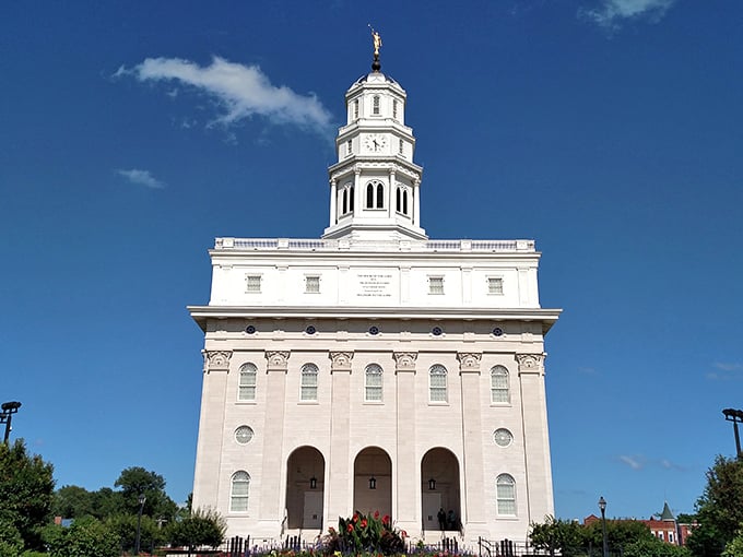 Soaring against the Illinois sky, the Nauvoo Temple commands attention like a Hollywood celebrity at a small-town diner. Its gleaming white limestone practically glows at sunset.