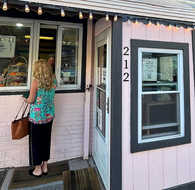 The ordering window: where dreams and reality meet. Just one person stands between you and pastry nirvana. 