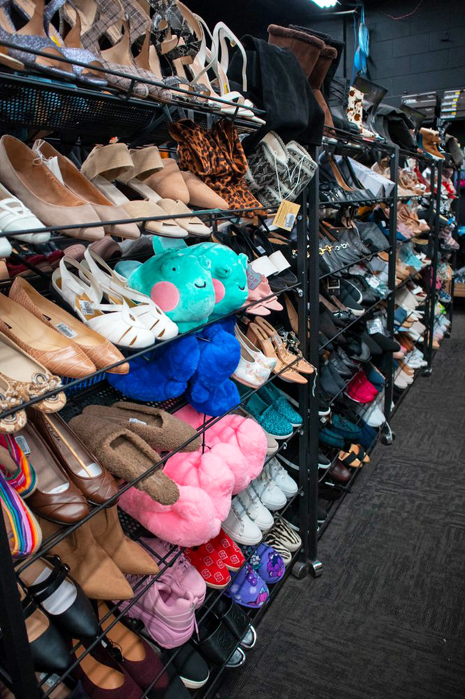 Footwear fantasyland! From practical flats to stylish boots, with colorful plush slippers adding whimsy to the serious business of shoe shopping.