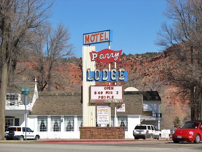 The iconic Parry Lodge sign stands as a colorful sentinel to Hollywood history, where Western film legends once rested their boots.