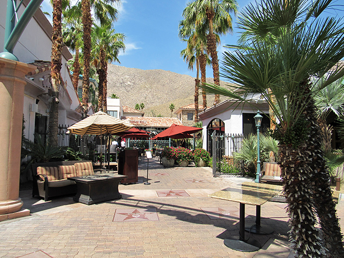 Stars at your feet, sunshine overhead. Palm Springs' outdoor plazas offer shaded retreats between vintage shops when the desert heat cranks up.