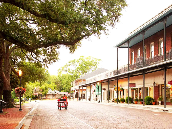 A historic carriage rolls down Natchitoches' iconic brick streets, where time slows down and your retirement dollars stretch like saltwater taffy.