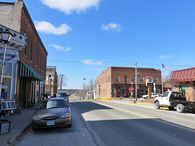 Downtown Perry feels like time travel without the DeLorean – classic storefronts under blue Midwestern skies invite leisurely exploration.