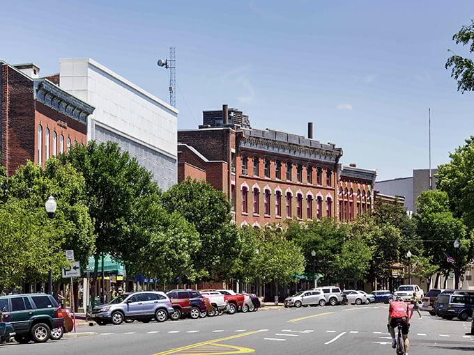 Historic brick buildings line downtown Greenfield, creating a streetscape where affordable living meets 19th-century architectural character.