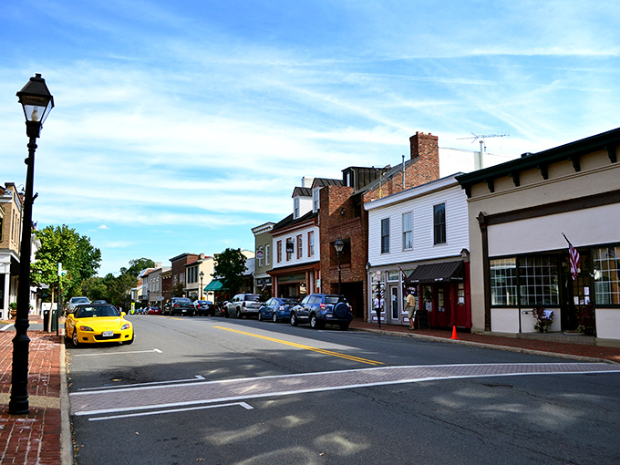 That bright yellow sports car is the only thing moving faster than the relaxed pace of life on this historic street lined with brick buildings and endless charm.