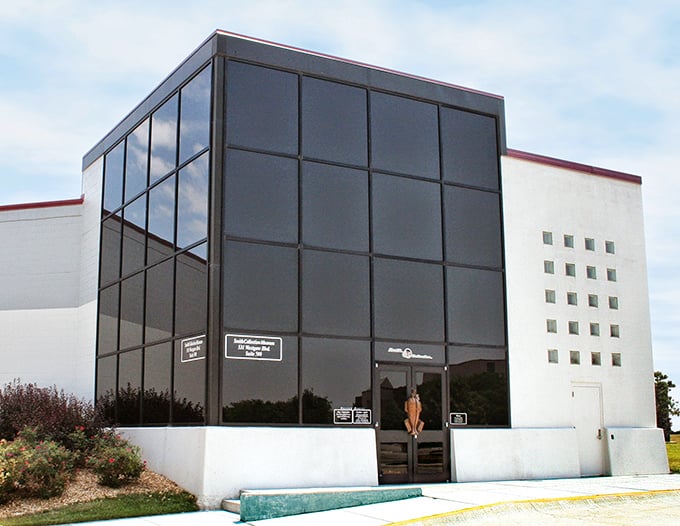 The sleek, modern exterior of the museum gives little hint of the mechanical wonders inside&mdash;like a birthday present wrapped in understated paper hiding the perfect gift.