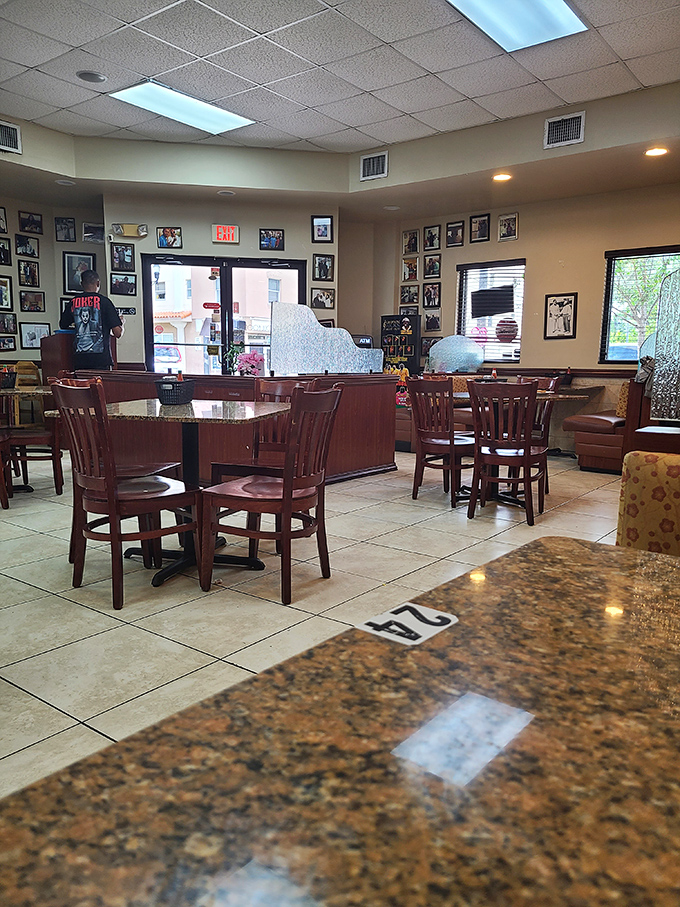 Inside, framed memories line the walls while granite-topped tables await the next round of soul food pilgrims seeking Miami's most authentic Southern cooking.