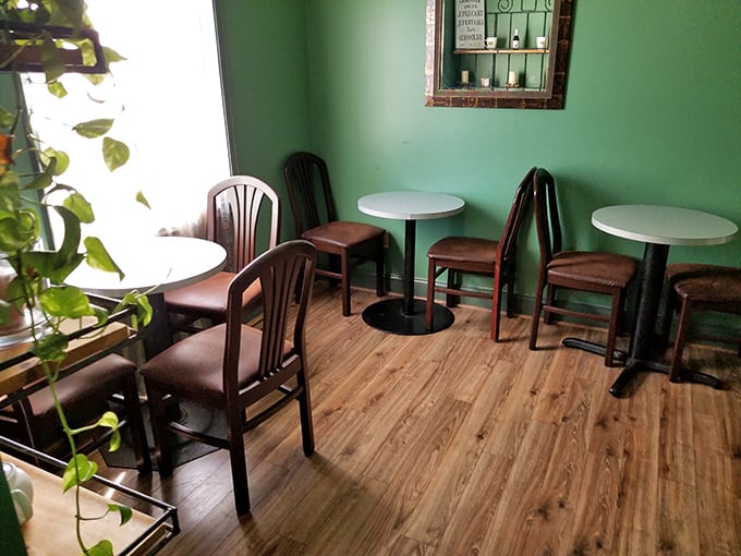 Mint green walls and simple wooden furniture create a no-frills dining space where the food, not the d&eacute;cor, takes center stage.