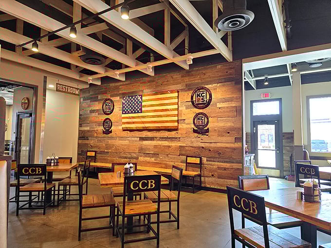 Rustic meets refined in this dining room where the wooden American flag serves as both patriotic d&eacute;cor and a silent promise of all-American flavor excellence.