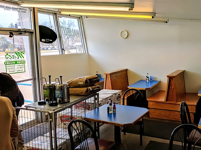 Simple wooden booths and no-frills tables tell you immediately: the focus here is on the food, not fancy furniture or Instagram backdrops.