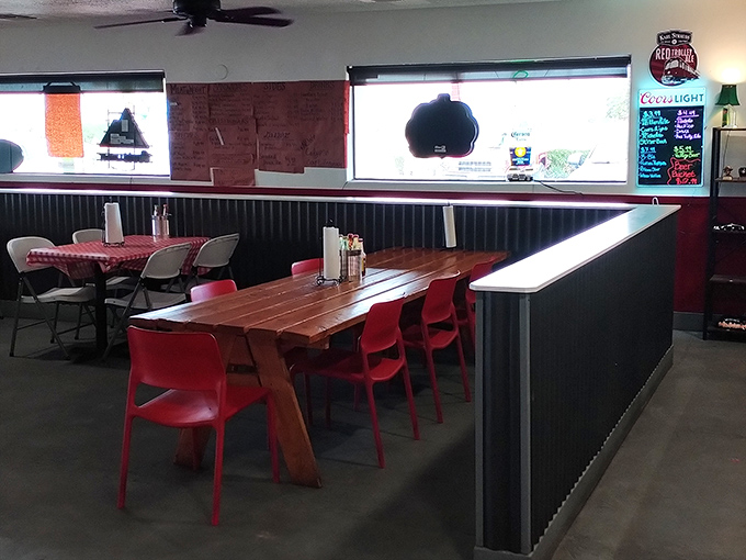 Red chairs and wooden tables create a no-nonsense dining space where the only distraction from your meal is the tempting aroma from the kitchen.