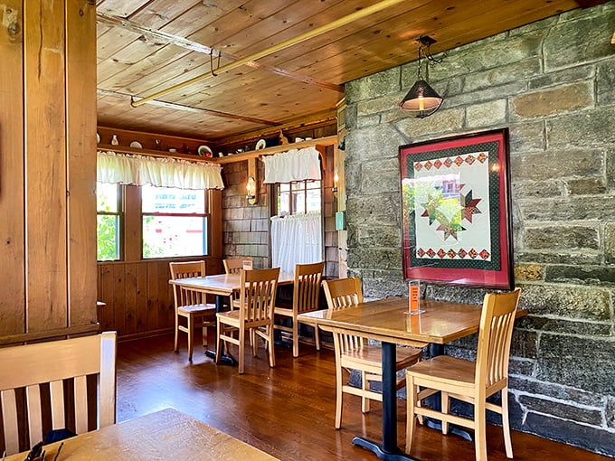 Stone walls and wooden beams tell stories of decades past, while simple tables stand ready for the memories you're about to make.