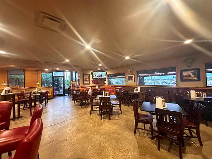 Step into BBQ sanctuary where polished concrete floors and wood paneling create the perfect backdrop for the meat meditation about to commence.