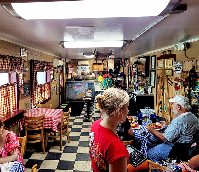 Step inside and discover a cozy dining room where checkered charm meets serious barbecue business.