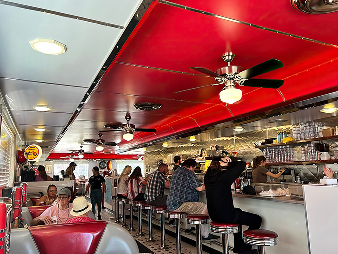 Under that iconic red ceiling, strangers become neighbors and calories don't count. This is America's living room with better food.