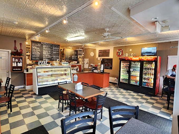 The checkerboard floor and cozy interior might scream "diner nostalgia," but the blackboard menu promises something far beyond your standard lunch counter fare.