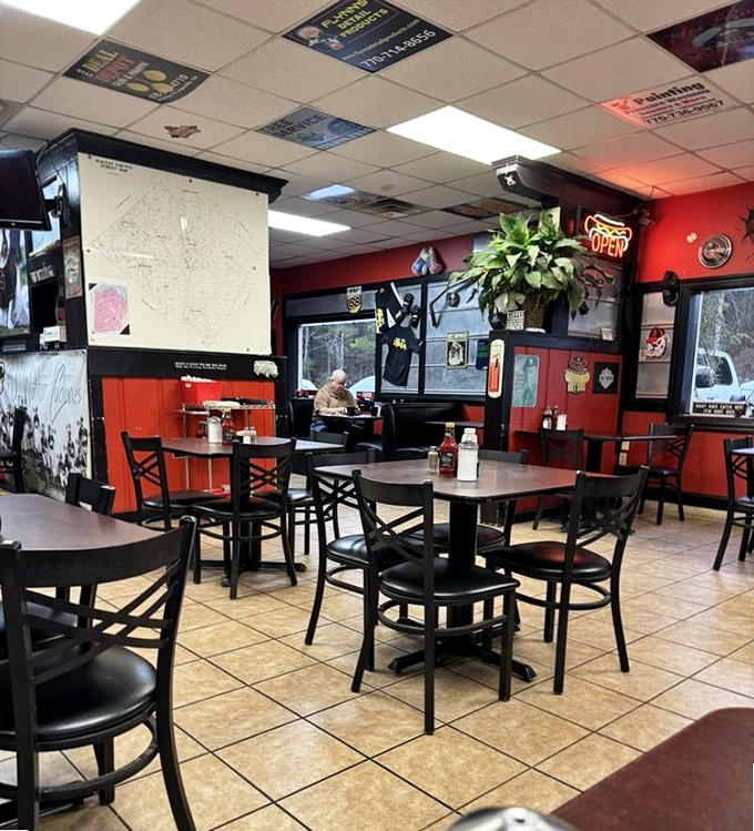 Red walls, hanging plants, and memorabilia create that perfect "everybody knows your name" atmosphere where comfort food and conversation flow equally freely.