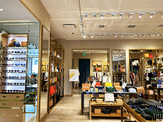 Inside this temple of markdown magic, perfectly arranged displays tempt shoppers with the siren song of "additional 40% off."