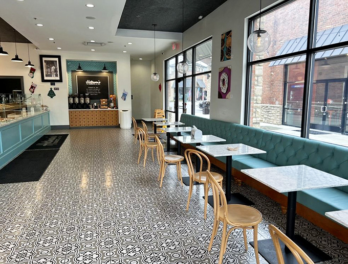 Modern meets nostalgic in Holtman's interior, where those tufted turquoise banquettes practically beg you to settle in with your sugary prize.