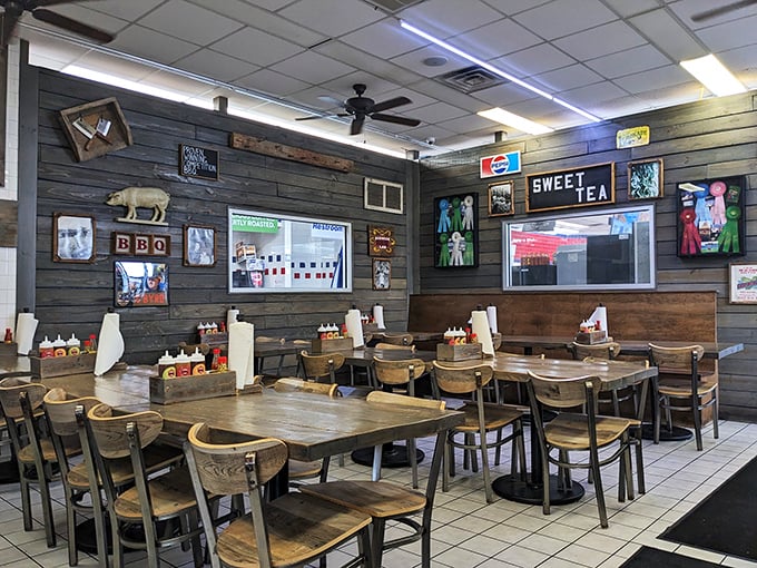 Rustic wood-paneled walls, simple tables, and BBQ memorabilia create an atmosphere where the food&mdash;not fancy d&eacute;cor&mdash;takes center stage.