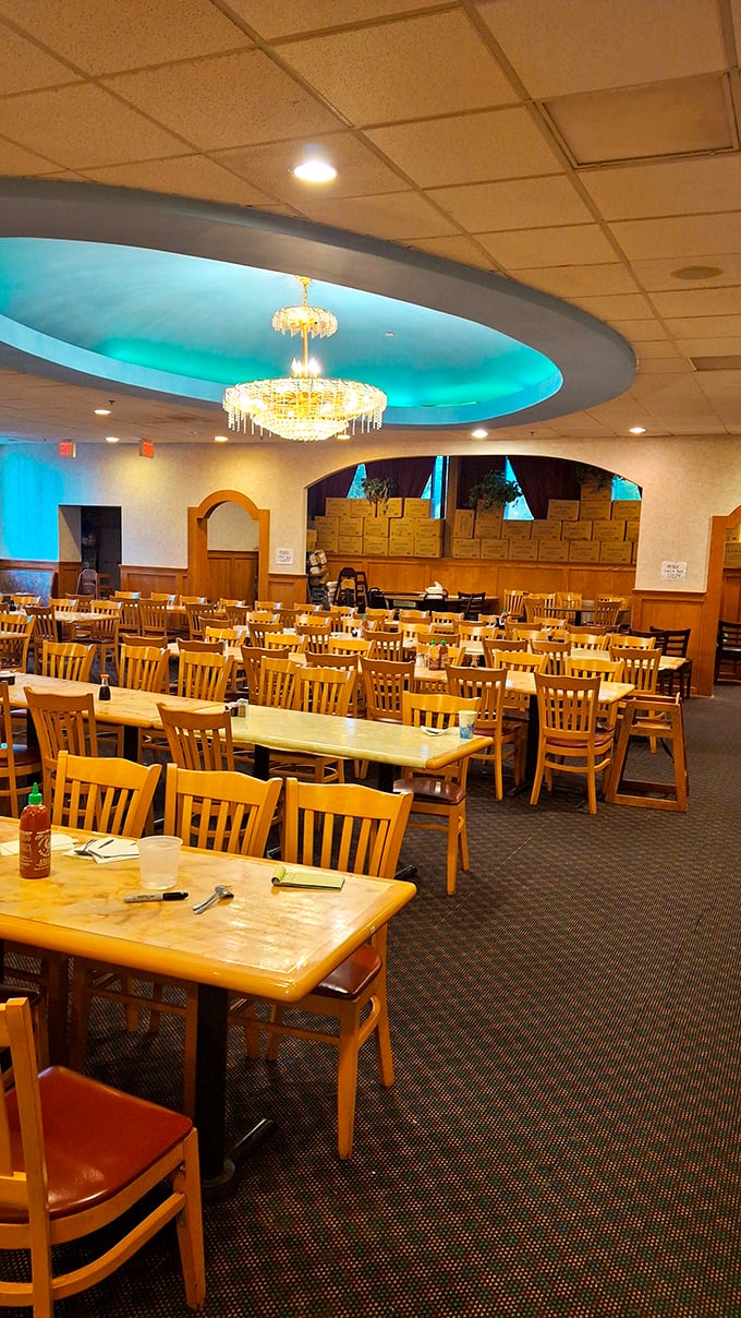 Beneath the blue-lit ceiling and chandelier, wooden tables await the impending plate parade. It's buffet dining with unexpected ambiance&mdash;like your aunt's dining room, but with unlimited crab legs. 