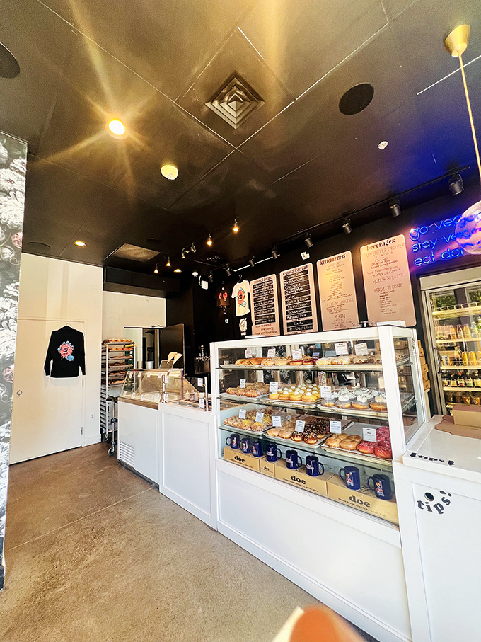 Step inside to a minimalist wonderland where donuts are the stars of the show. The display case gleams like a jewelry box for edible treasures
