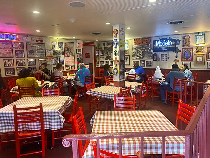 Step inside to a visual fiesta where every inch tells a story. Red chairs, checkered tablecloths, and walls plastered with memorabilia create an atmosphere that's deliciously authentic.