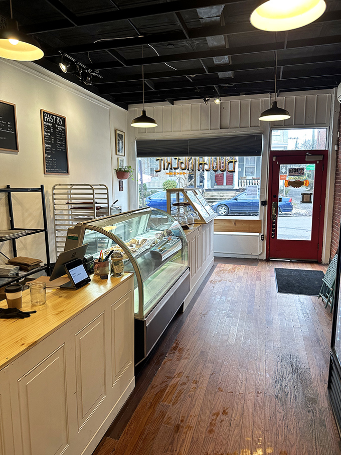 Step inside this narrow slice of paradise where wooden floors and white walls create the perfect backdrop for bread-based euphoria.