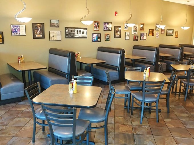 Classic blue vinyl booths and simple tables create that authentic deli atmosphere where conversations flow as freely as the coffee.