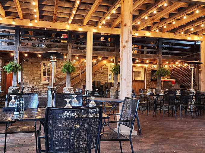 Step inside and you're greeted by centuries-old timber beams, stone walls, and string lights that create an atmosphere no interior designer could replicate for any amount of money.