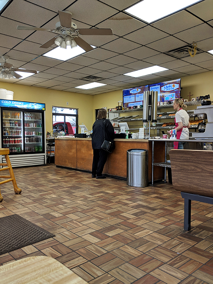 Where donut magic happens. The no-frills interior speaks volumes: they're too busy perfecting pastries to worry about fancy decor.