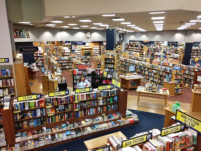 A bibliophile's dream come true &ndash; shelves stretching toward the horizon like literary skyscrapers, each aisle a new neighborhood to explore.