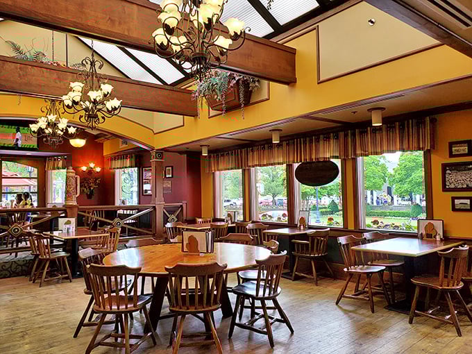 Warm wood, golden lighting, and those sturdy chairs that say, "Stay awhile, eat something that requires unbuttoning your pants later."