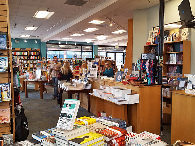 Inside, wooden shelves create canyons of possibility where browsers lose track of time and rediscover the joy of serendipitous literary encounters.