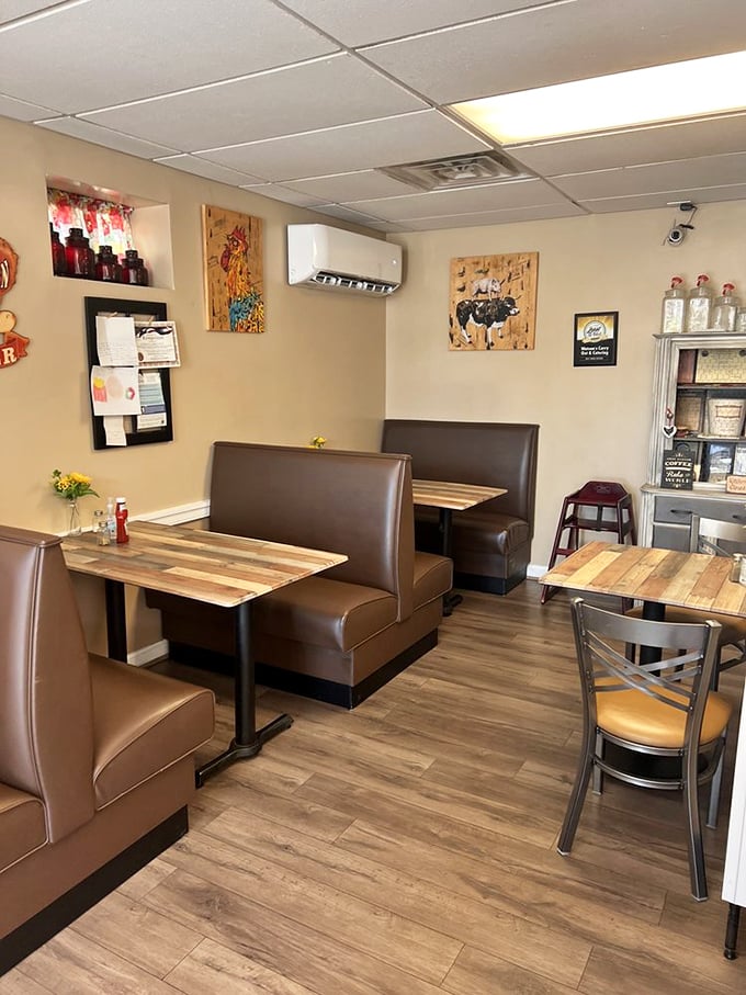 Inside, the cozy brown vinyl booths and wooden tables create that perfect "neighborhood joint" atmosphere where comfort trumps pretension and flavor reigns supreme.