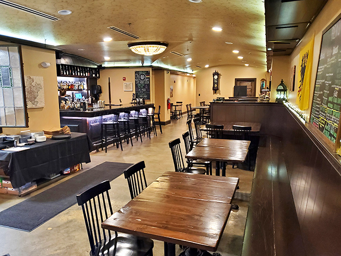 Inside, wooden tables and simple black chairs create that perfect "gemütlichkeit" atmosphere—that's German for "why yes, I will have another pretzel."