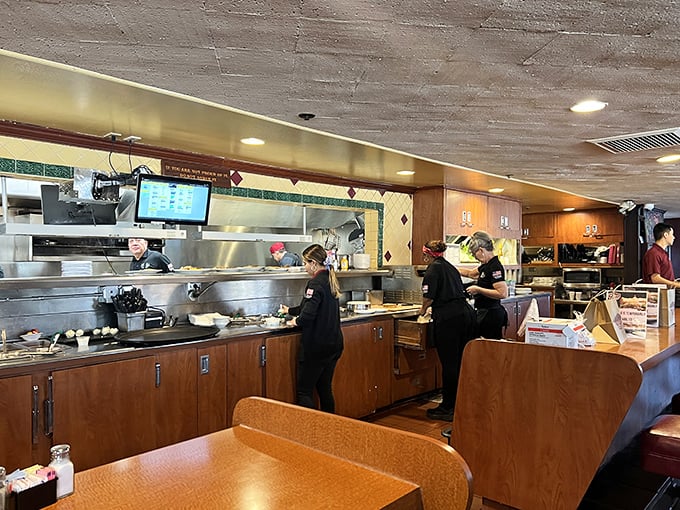 Behind the scenes magic happens here, where skilled hands have been crafting that legendary chicken fried steak for decades.