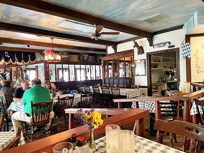 Wood-beamed ceilings, checkered tablecloths, and cozy seating create the perfect backdrop for your upcoming food coma. German comfort awaits!