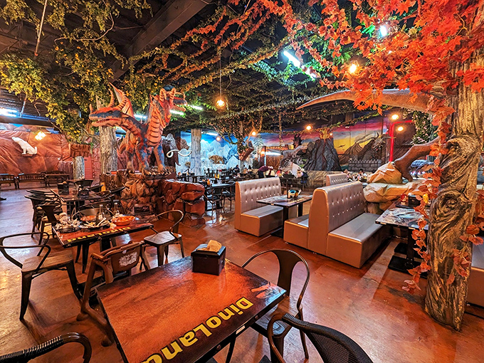 Step inside and suddenly you're dining in a Jurassic jungle. The vibrant canopy overhead makes you wonder if velociraptors might be watching your table manners.