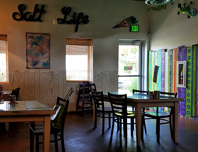 "Salt Life" isn't just a wall decoration here&mdash;it's a philosophy. Wooden accents and bamboo window treatments transform Kentucky into a beachside escape.