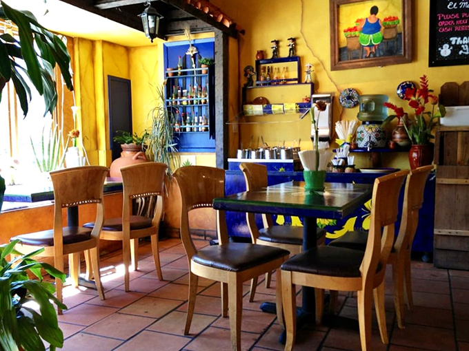 The interior feels like your favorite Mexican grandmother invited you over for dinner. Those wooden chairs have heard thousands of "mmm" sounds from satisfied diners.