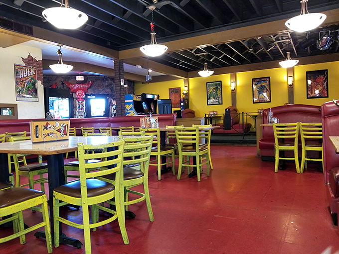 Step inside and the vibrant red floor meets lime green chairs in a color combination that says, "Boring food not served here." Comic book heroes stand guard over your meal. 