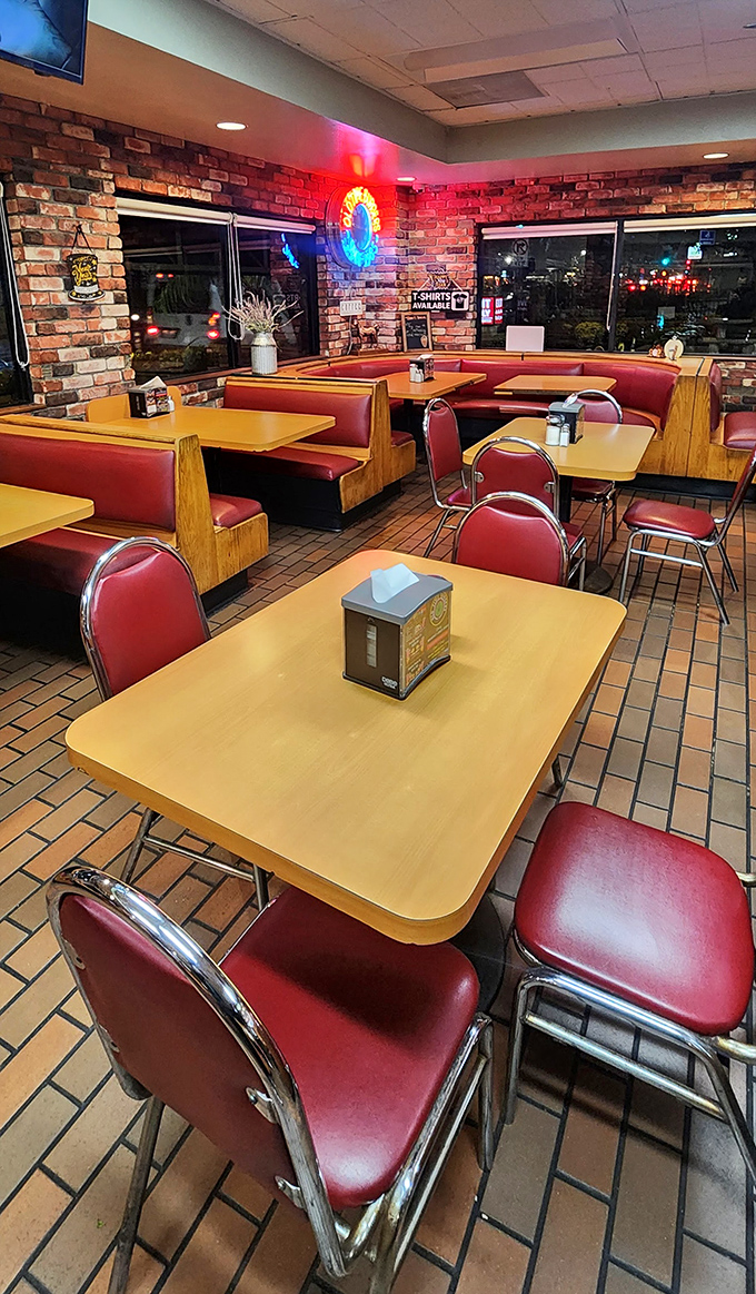 Step into a time machine of taste with these cherry-red vinyl booths and warm brick walls—where conversations flow as freely as the coffee refills.