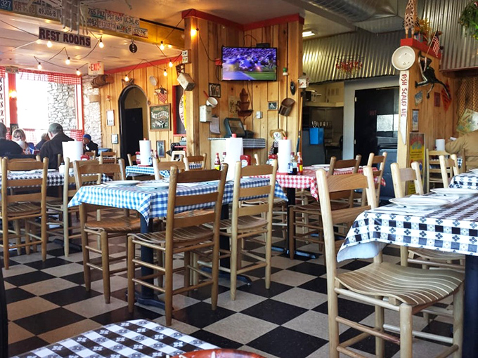 Checkered tablecloths and wood-paneled walls create the perfect backdrop for serious eating. This isn't d&eacute;cor&mdash;it's a commitment to authenticity.
