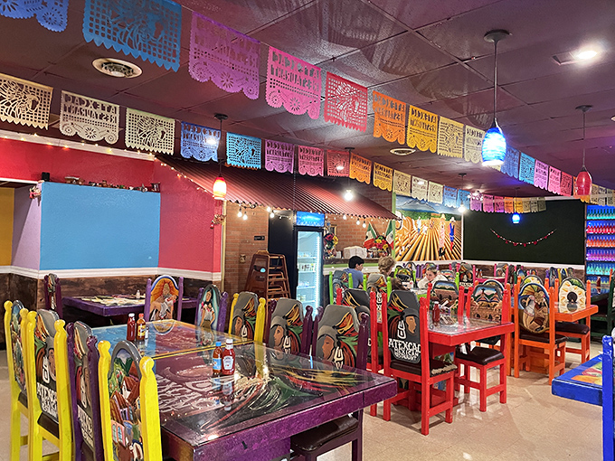 Step inside and the fiesta begins! Colorful papel picado banners dance overhead while vibrant chairs invite you to sit down for the main event.