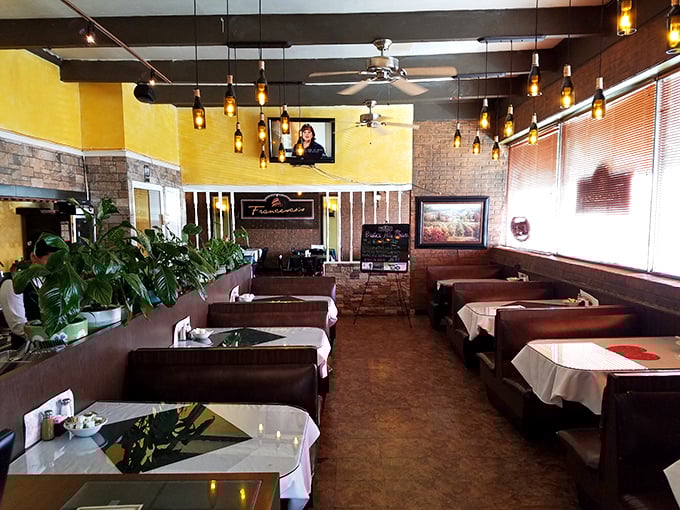 Yellow walls and pendant lighting create that perfect "come as you are" atmosphere where food conversations flow as freely as the wine.